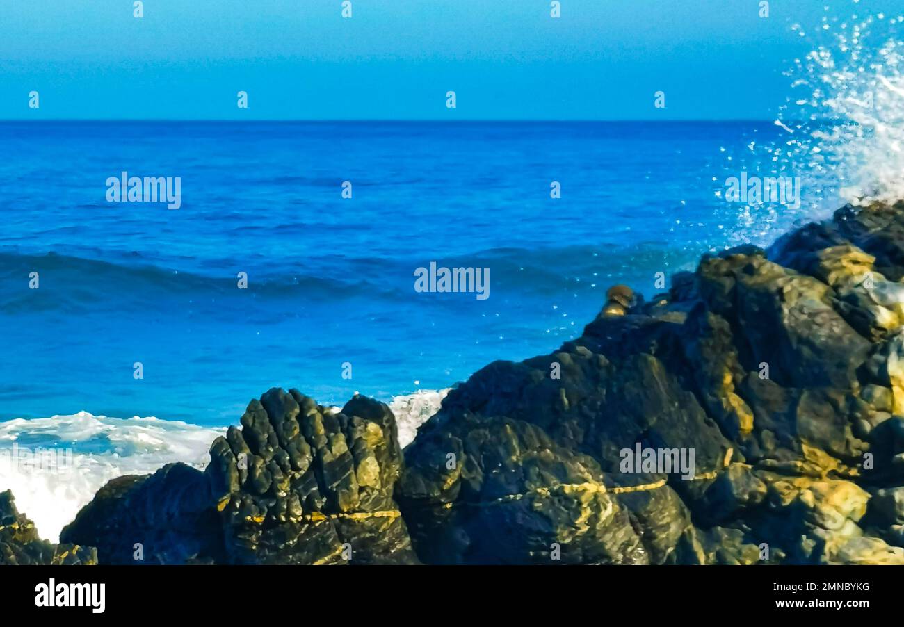 Beautiful rocks cliffs stones and boulders and huge big surfer waves on ...