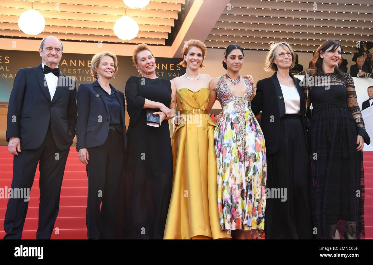Cast and crew of the film 'Girls of The Sun' pose for photographers ...