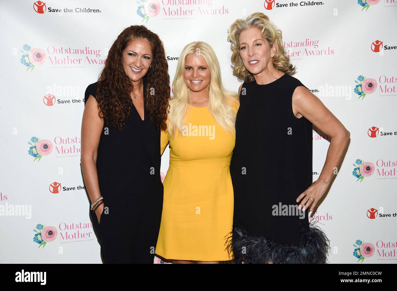 Honorees Artemis Patrick, left, Jessica Simpson and Jan Singer pose ...