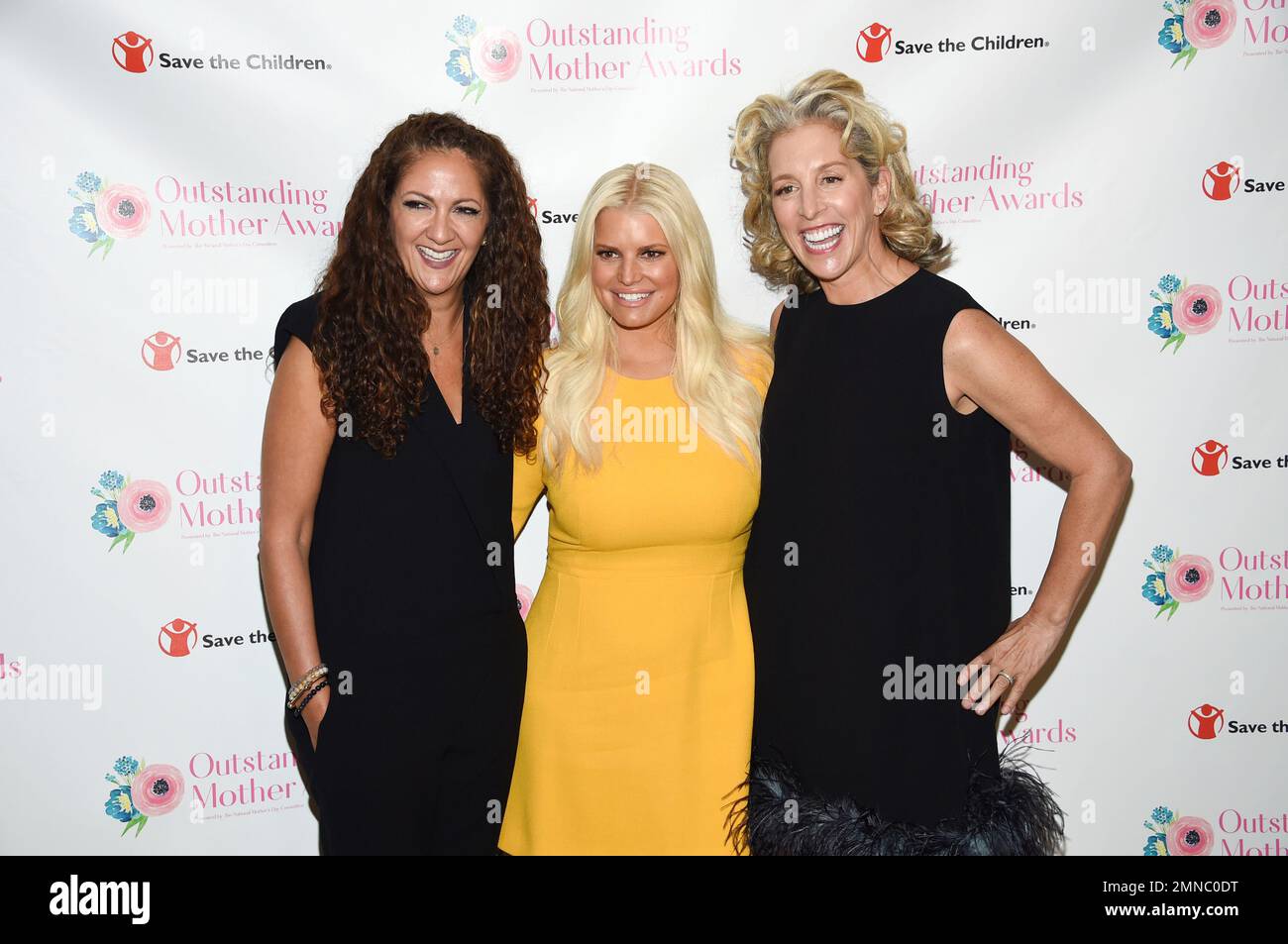 Honorees Artemis Patrick, left, Jessica Simpson and Jan Singer pose ...