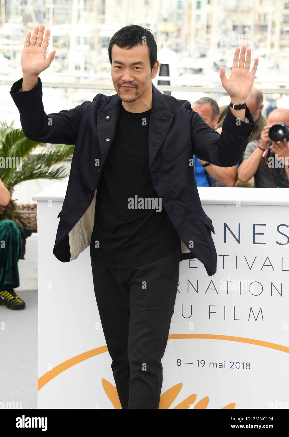 Actor Liao Fan poses for photographers during a photo call for the film ...