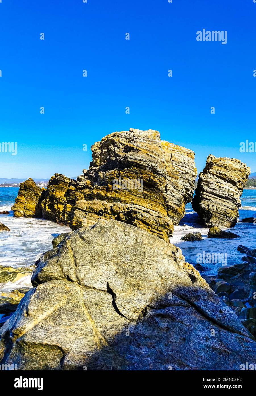 Beautiful rocks cliffs stones and boulders and huge big surfer waves on ...
