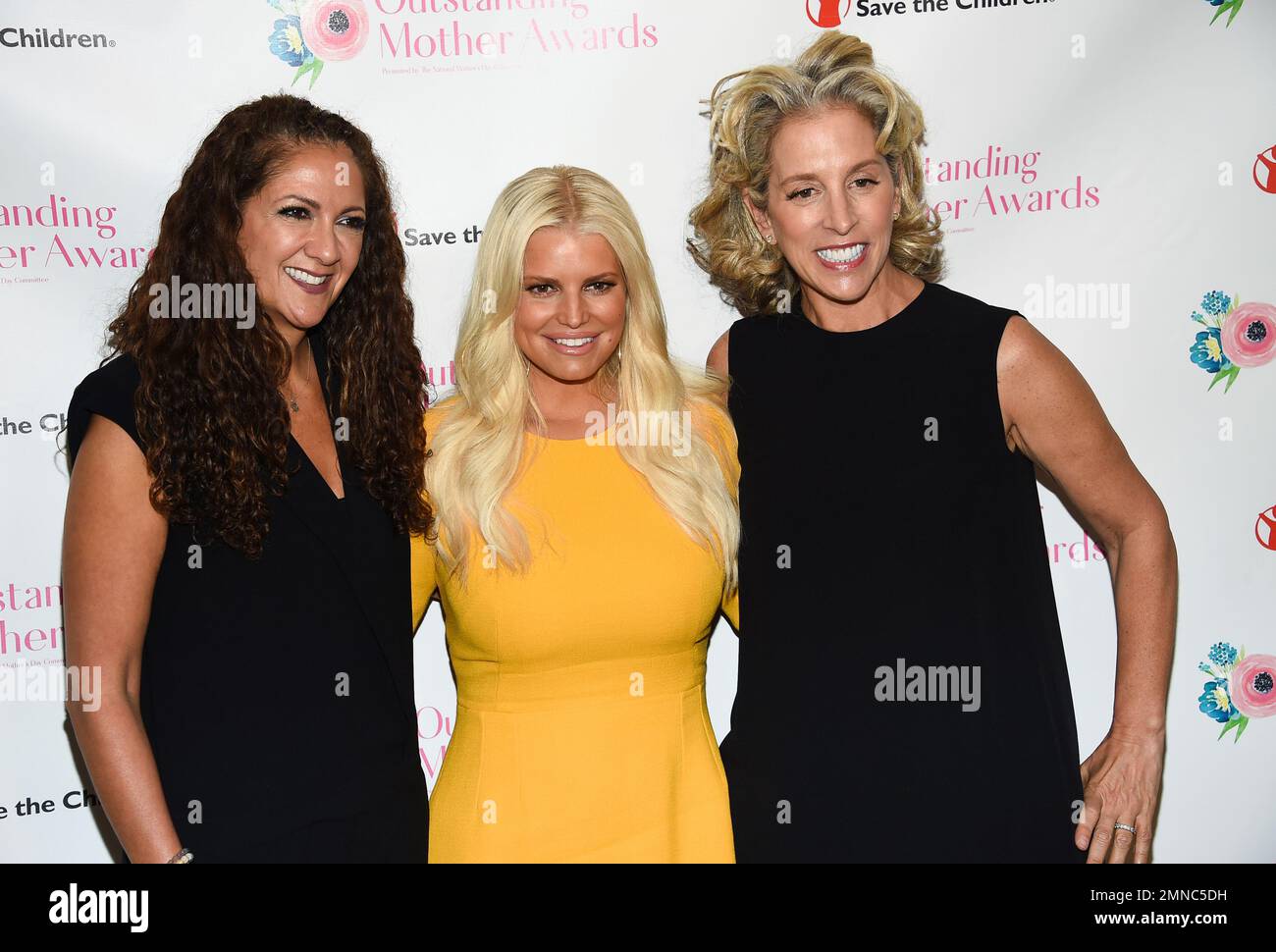 Honorees Artemis Patrick, left, Jessica Simpson and Jan Singer pose ...