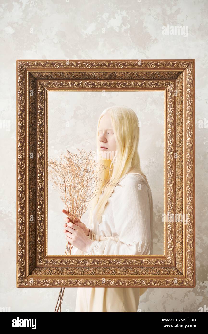 Woman Standing Behind Frame