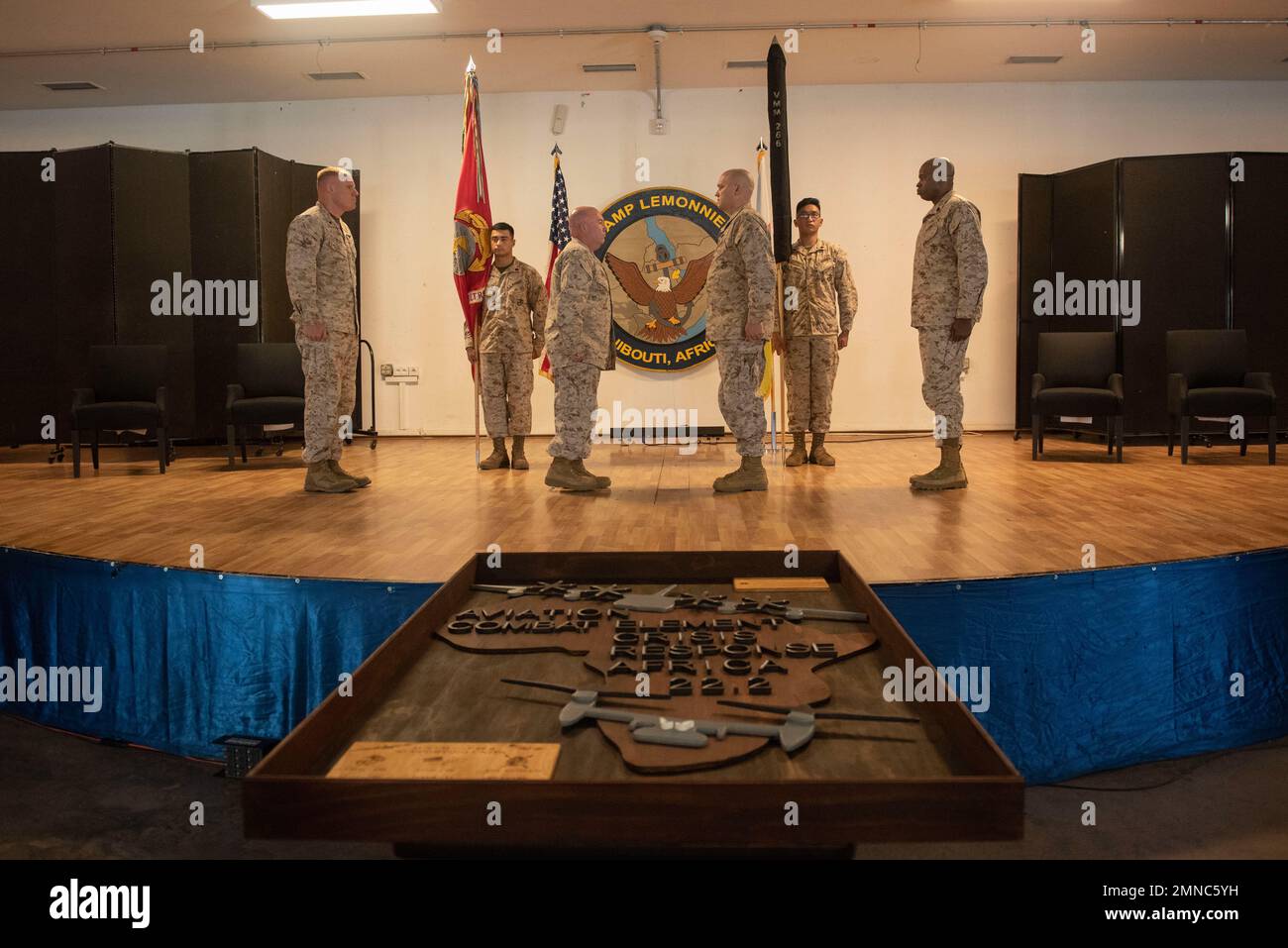 The outgoing Marine Medium Tilt-Rotor Squadron 163 command team (Left) stand next to the ...
