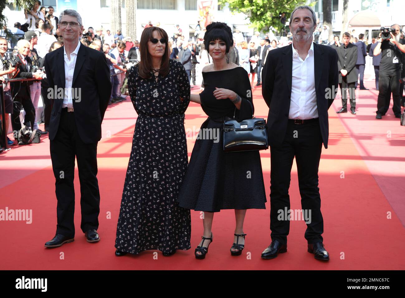 Director of photography Fabrice Aragno, from left, producers Nicole ...