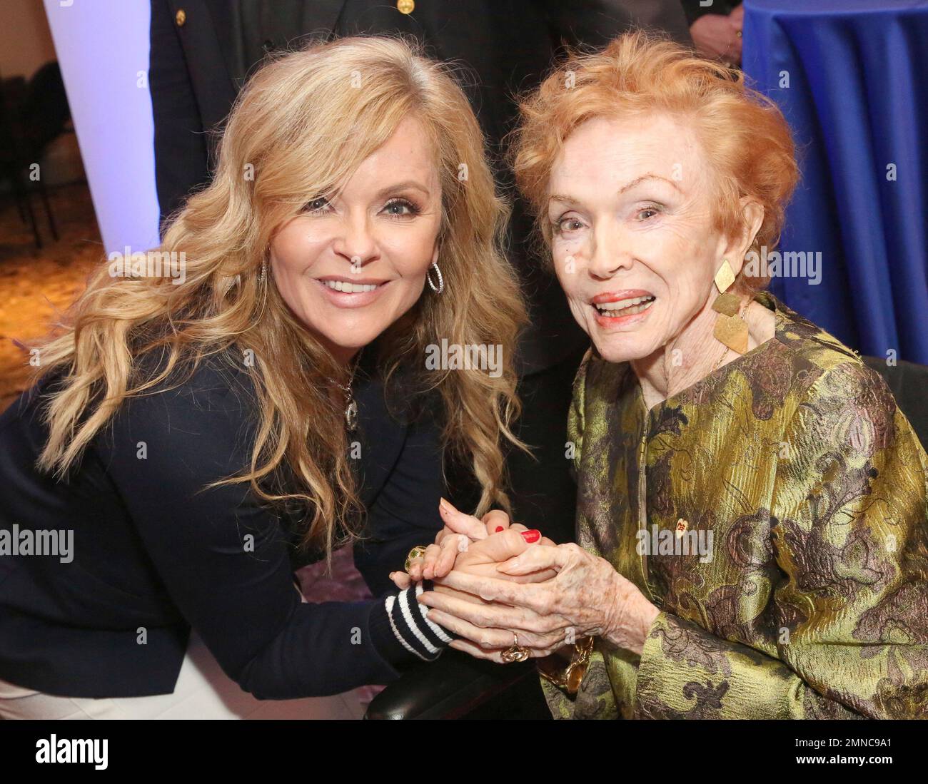 Jill Whelan, left, and Jeraldine Saunders attend a gathering after the ...