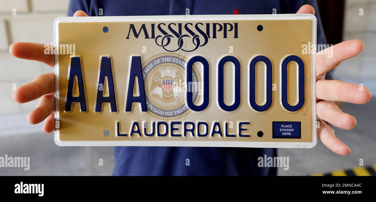 Clay Chandler, director of communications for Gov. Phil Bryant, holds ...