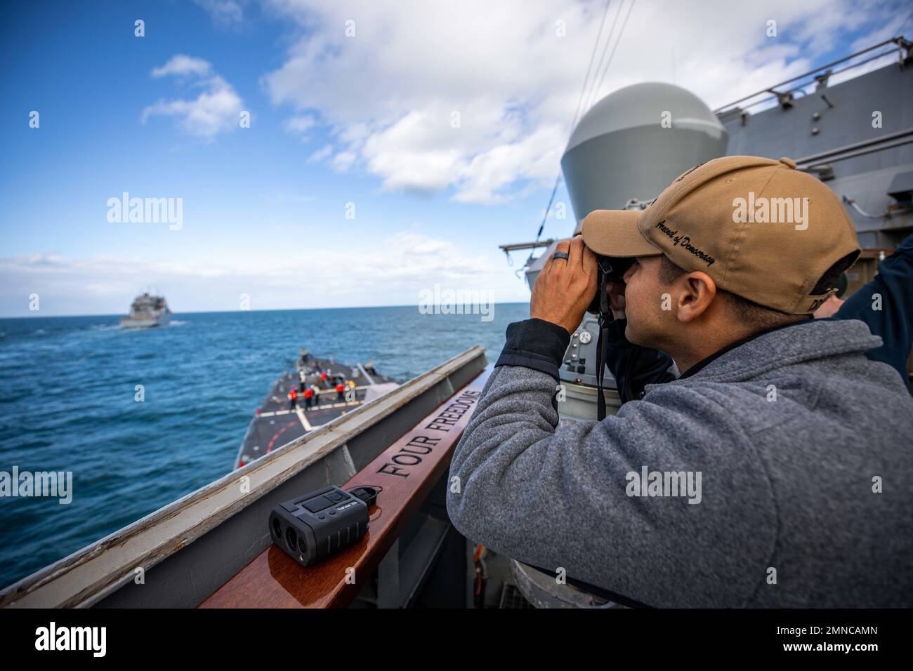 IRISH SEA (Oct. 1, 2022) Ensign Ernan Lopez looks through a laser-range ...