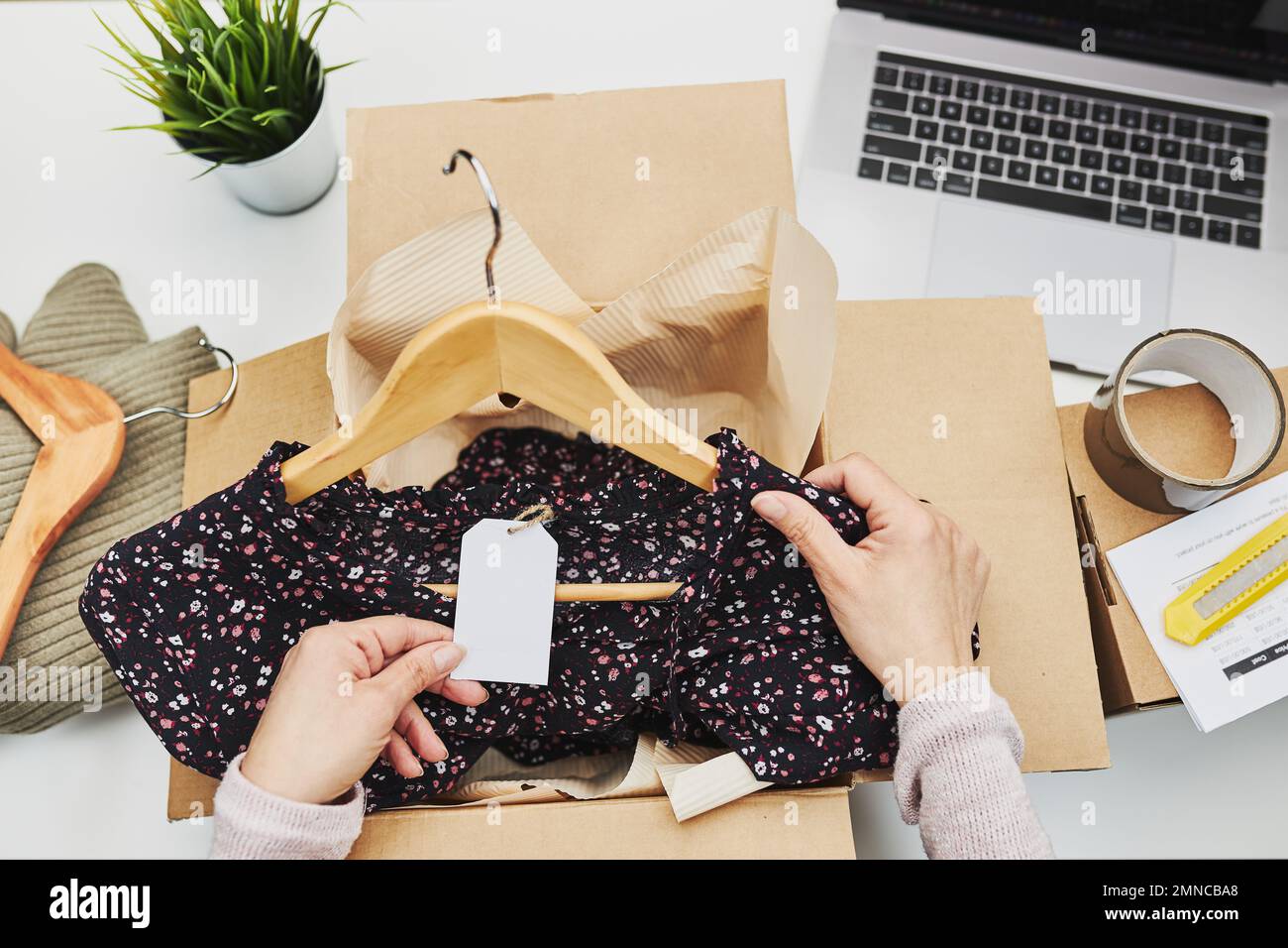 Business owner packing online order to delivery to customer. Preparing ...