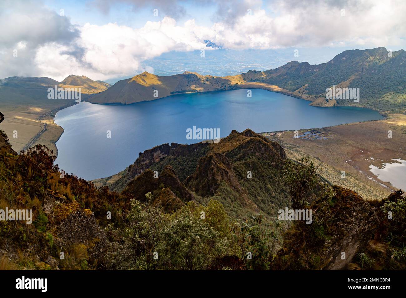 Blue lagoon in the middle of the Mojanda volcano in the Ecuadorian ...