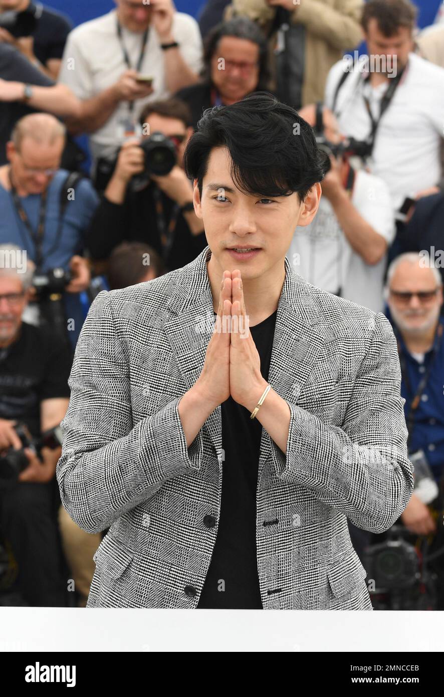 Actor Teo Yoo poses for photographers during a photo call for the film ...