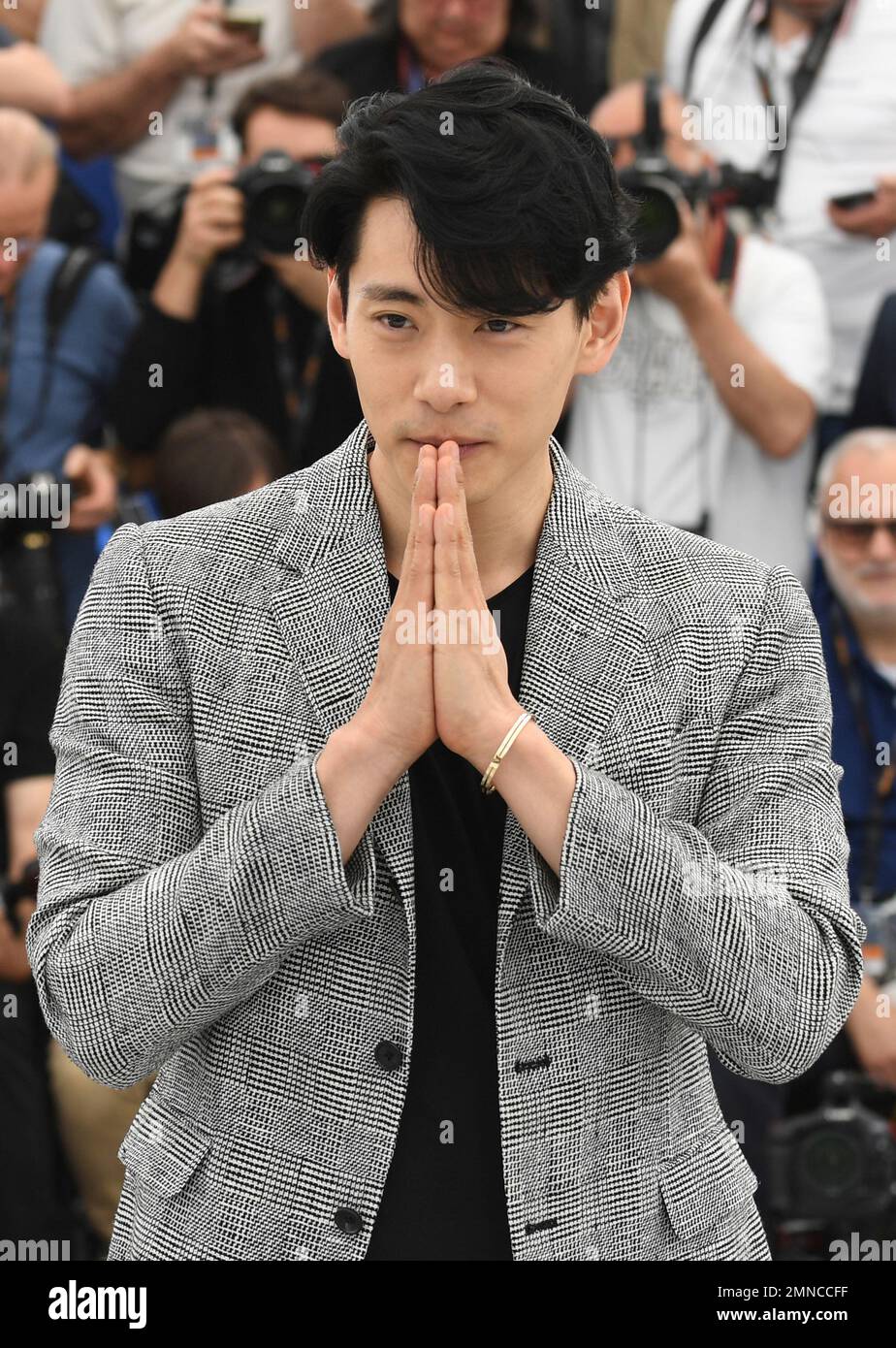 Actor Teo Yoo poses for photographers during a photo call for the film ...