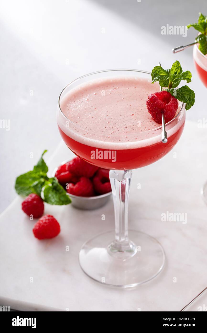 Raspberry martini cocktail with vodka, pineapple juice and raspberry ...