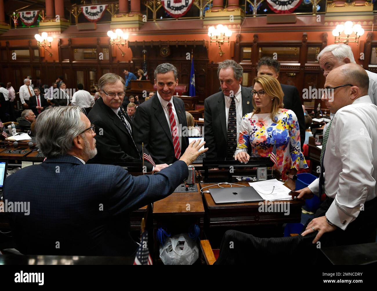State Rep. William Petit Jr., R-Plainville, left, talks to House ...