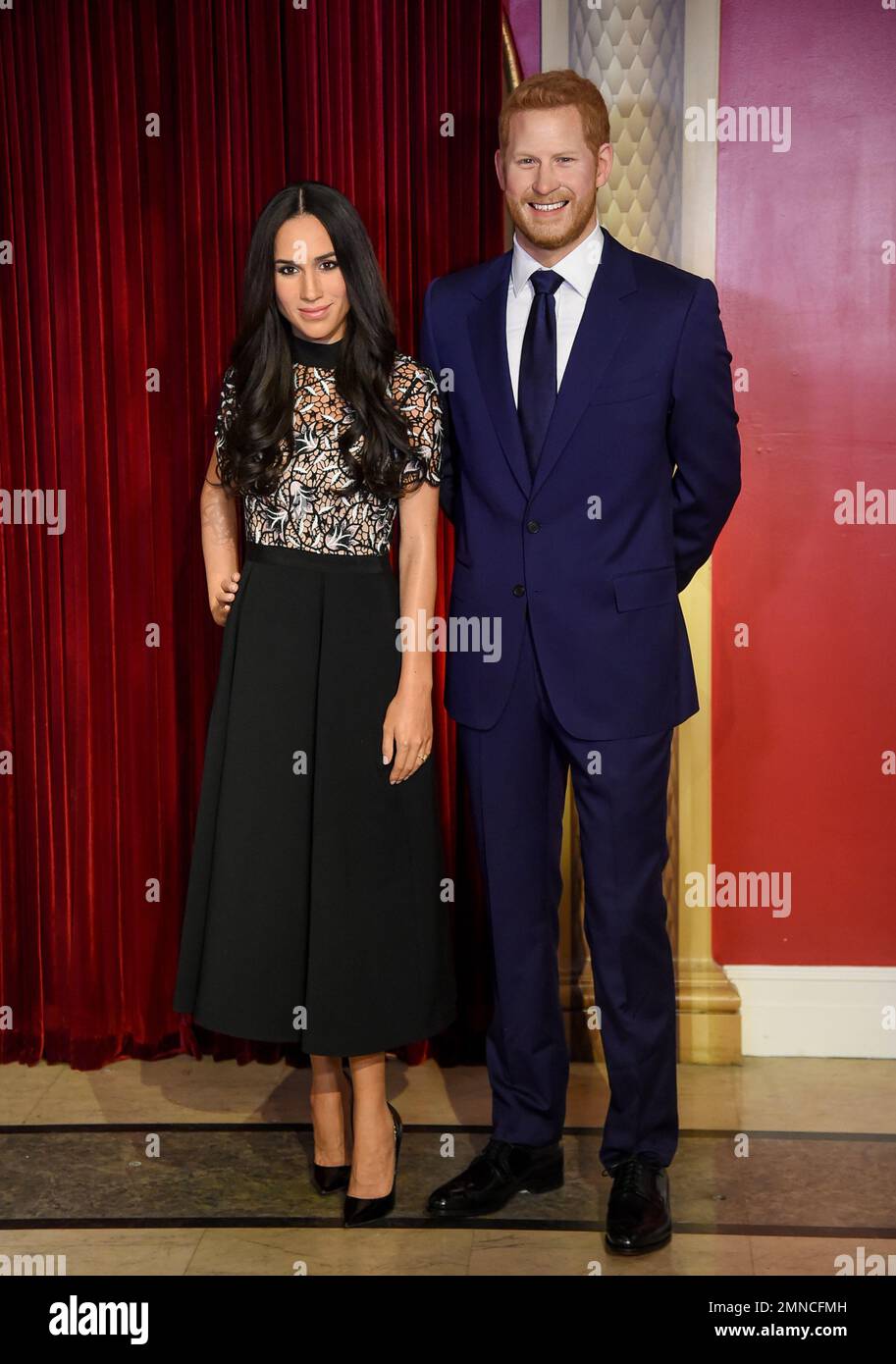 Wax figures depicting Meghan Markle, left, and Britain's Prince Harry ...