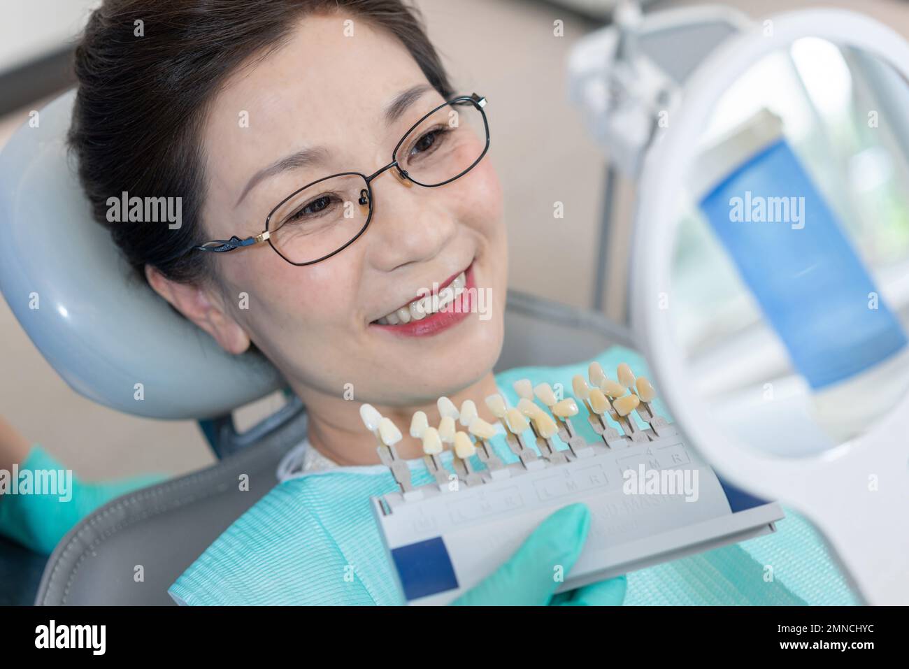 Patients in the dental clinic matching teeth Stock Photo - Alamy