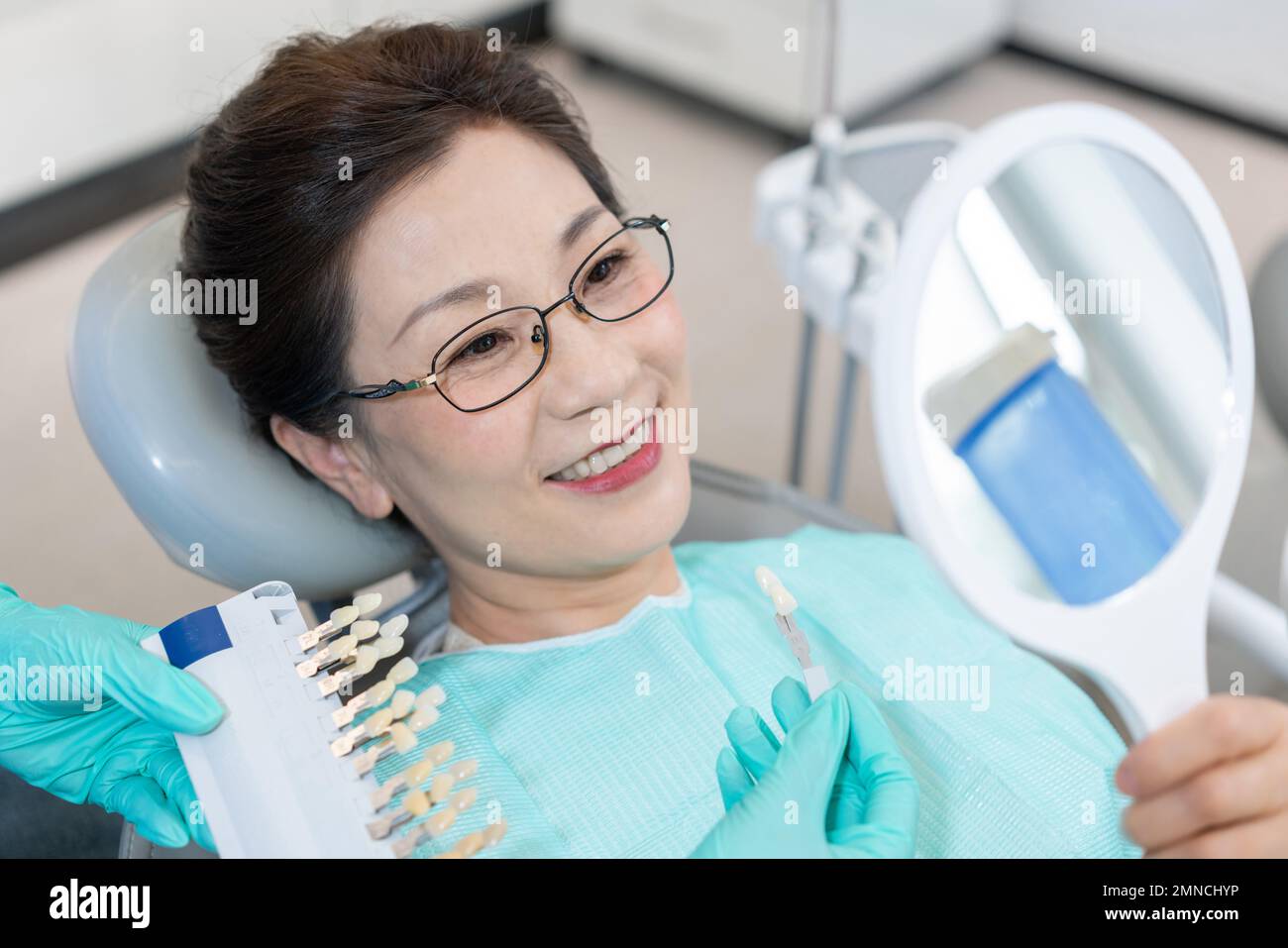 Patients in the dental clinic matching teeth Stock Photo - Alamy