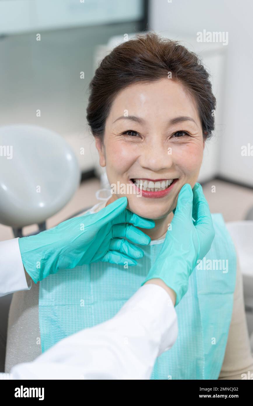 Patients in dental clinical check teeth Stock Photo - Alamy