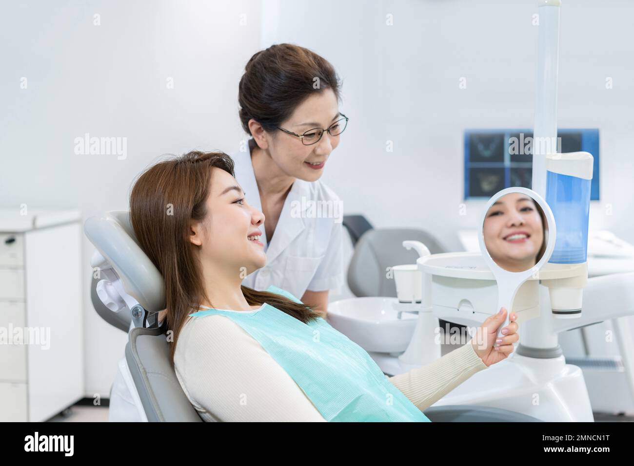 Doctors and patients in dental clinic Stock Photo - Alamy