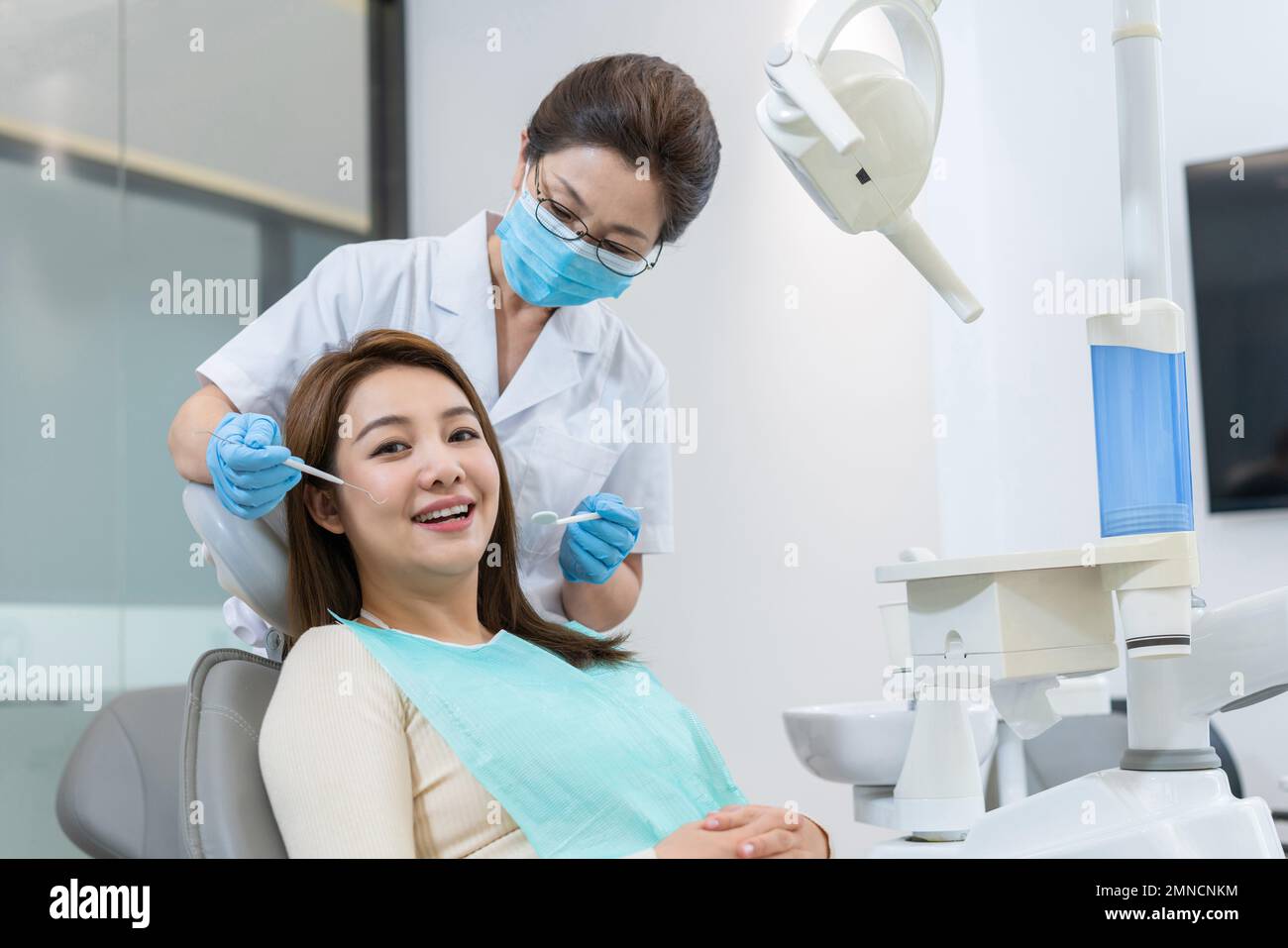 Doctors and patients in dental clinic Stock Photo - Alamy