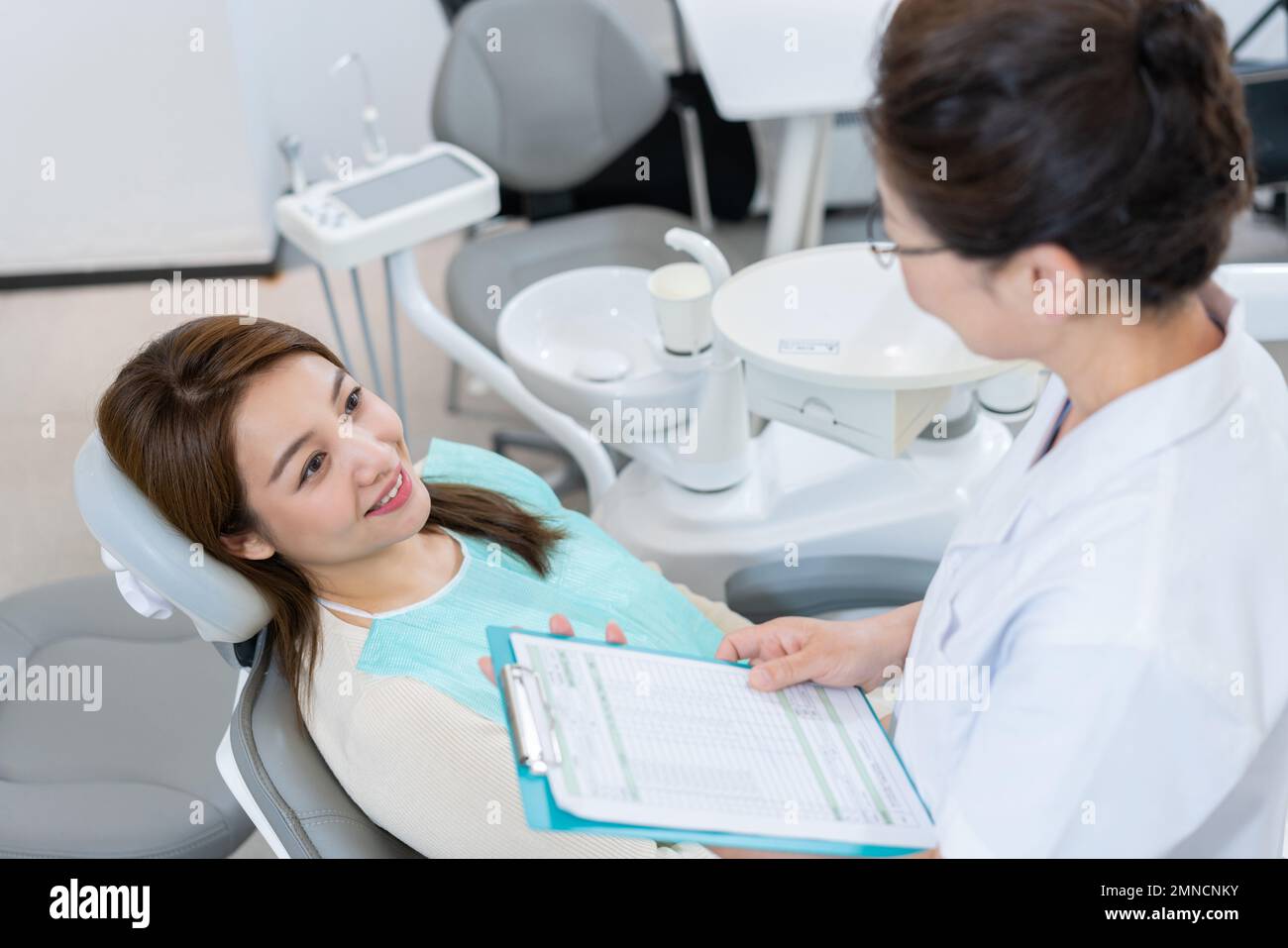 Doctors and patients in dental clinic Stock Photo - Alamy