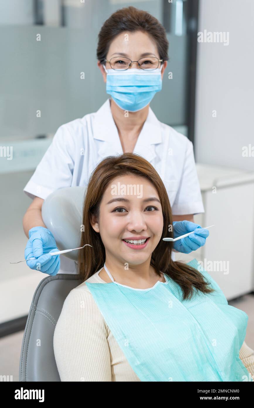 Doctors and patients in dental clinic Stock Photo - Alamy