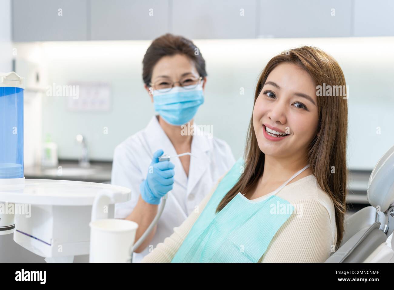 Doctors and patients in dental clinic Stock Photo - Alamy