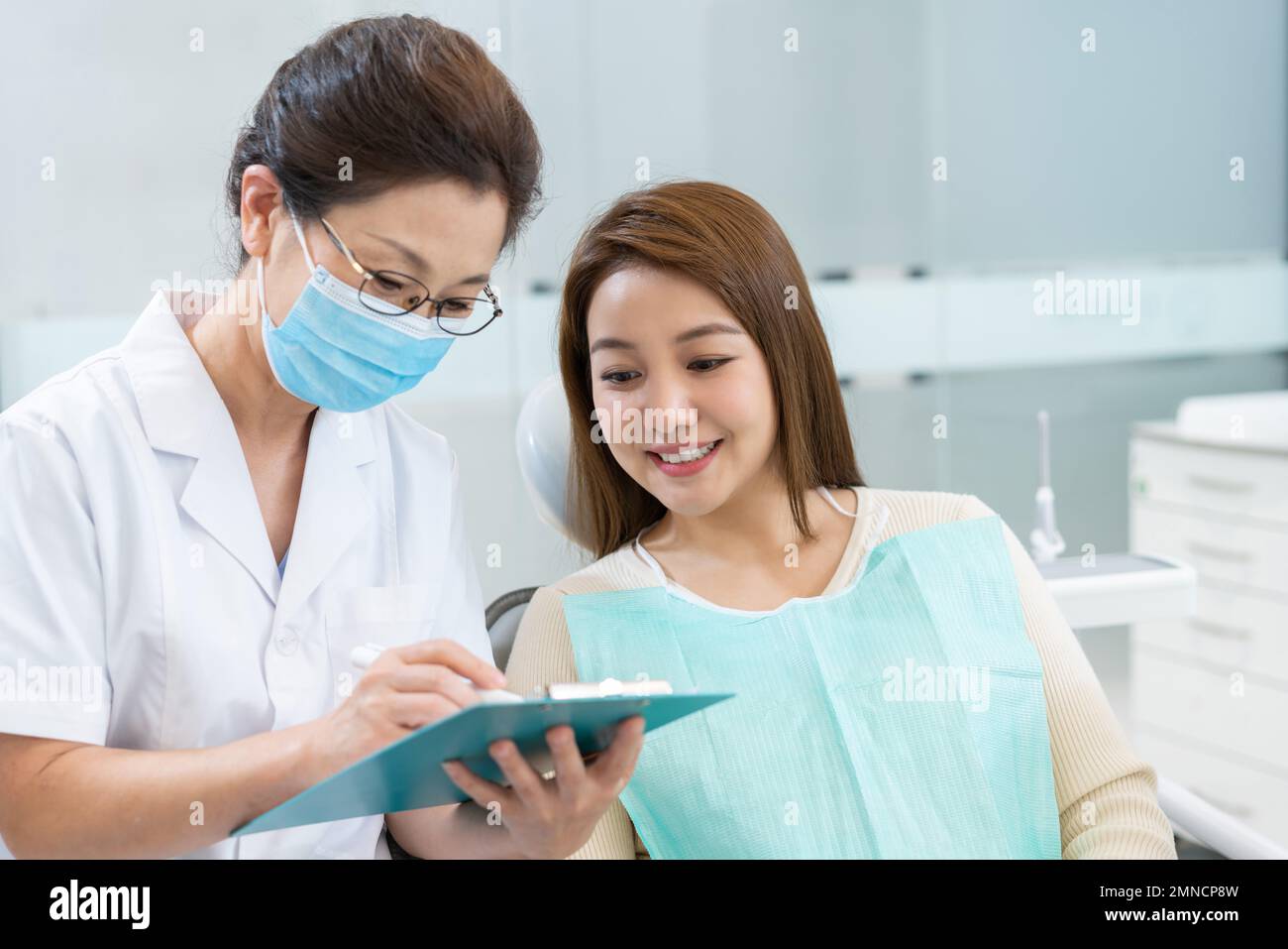 Doctors and patients in dental clinic Stock Photo - Alamy