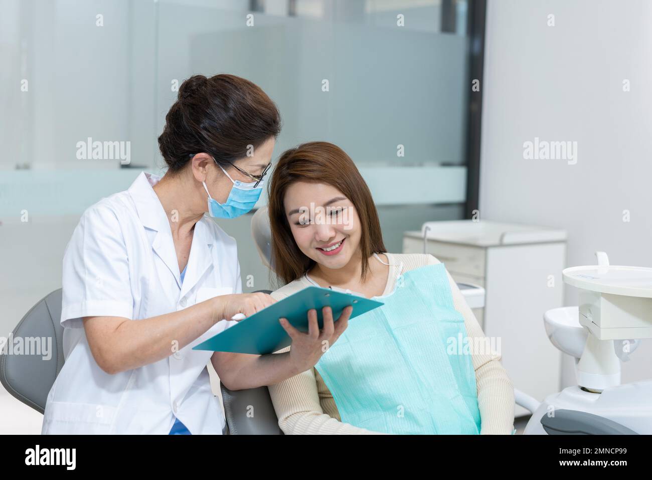 Doctors and patients in dental clinic Stock Photo - Alamy