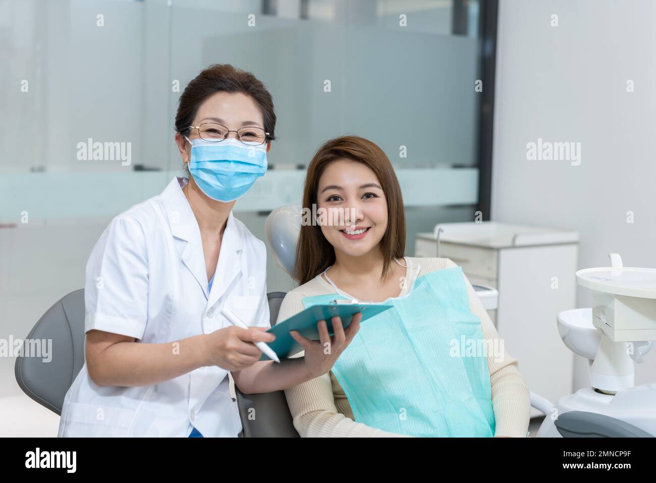 Doctors and patients in dental clinic Stock Photo - Alamy