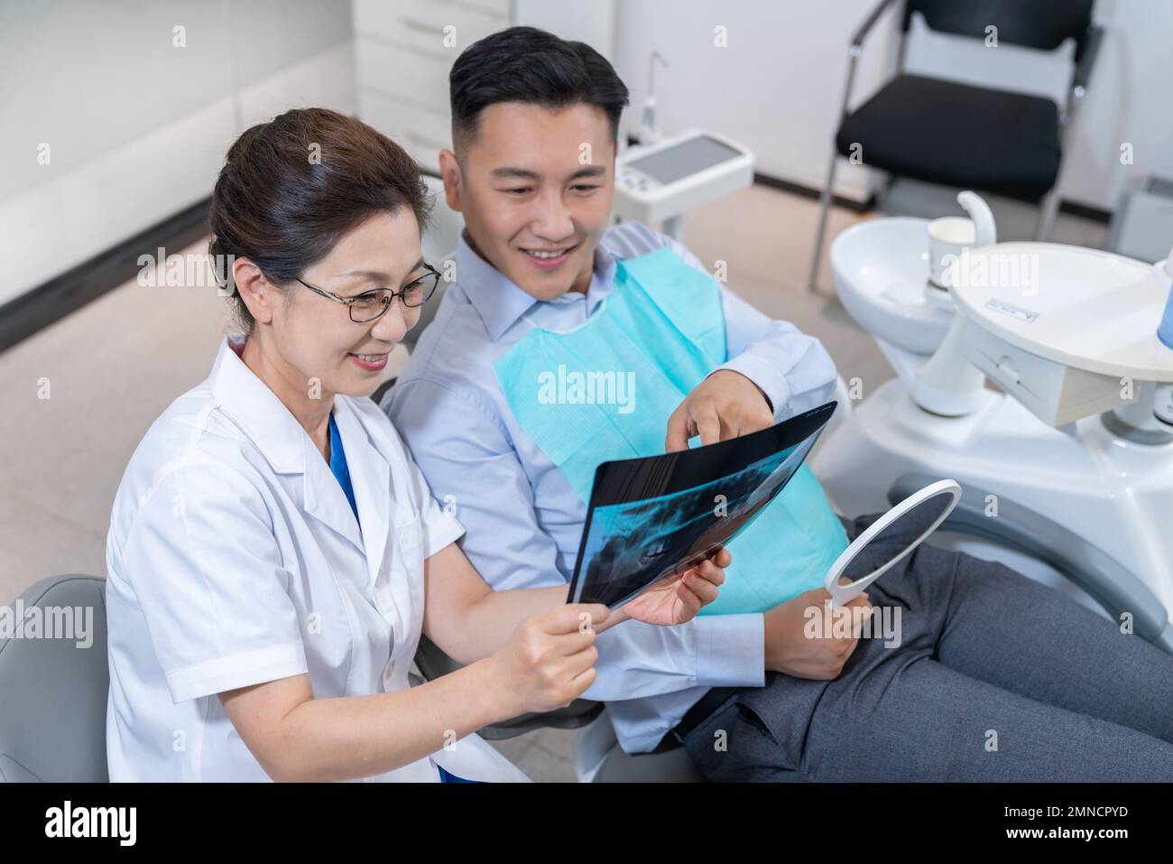 Doctors and patients in dental clinic Stock Photo - Alamy