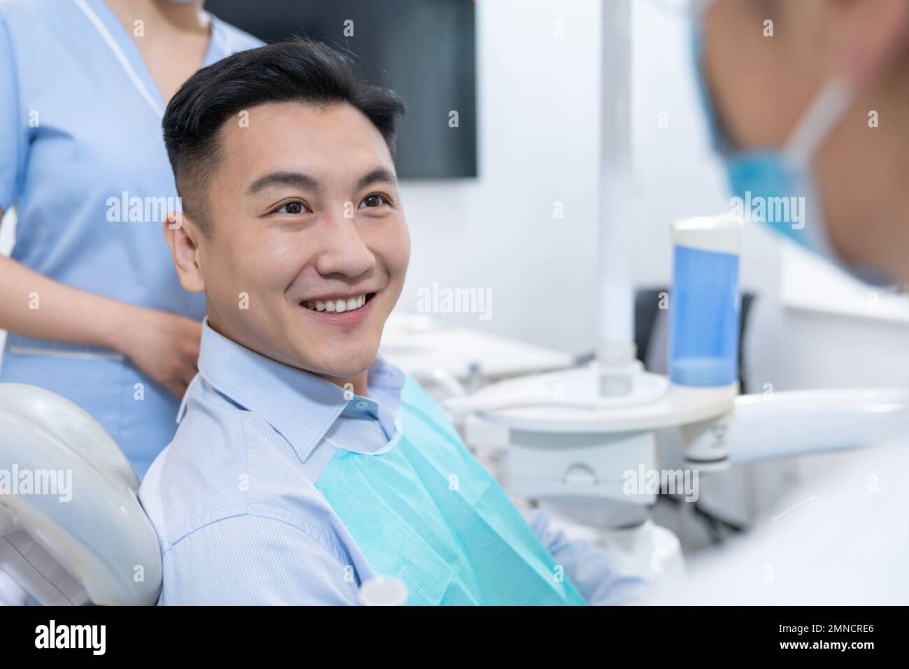 Doctors and patients in dental clinic Stock Photo - Alamy