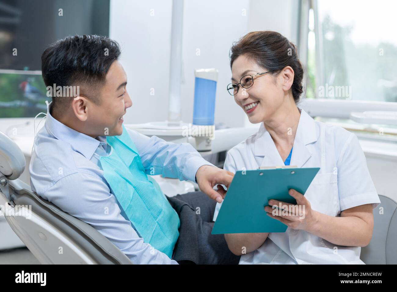Doctors and patients in dental clinic Stock Photo - Alamy