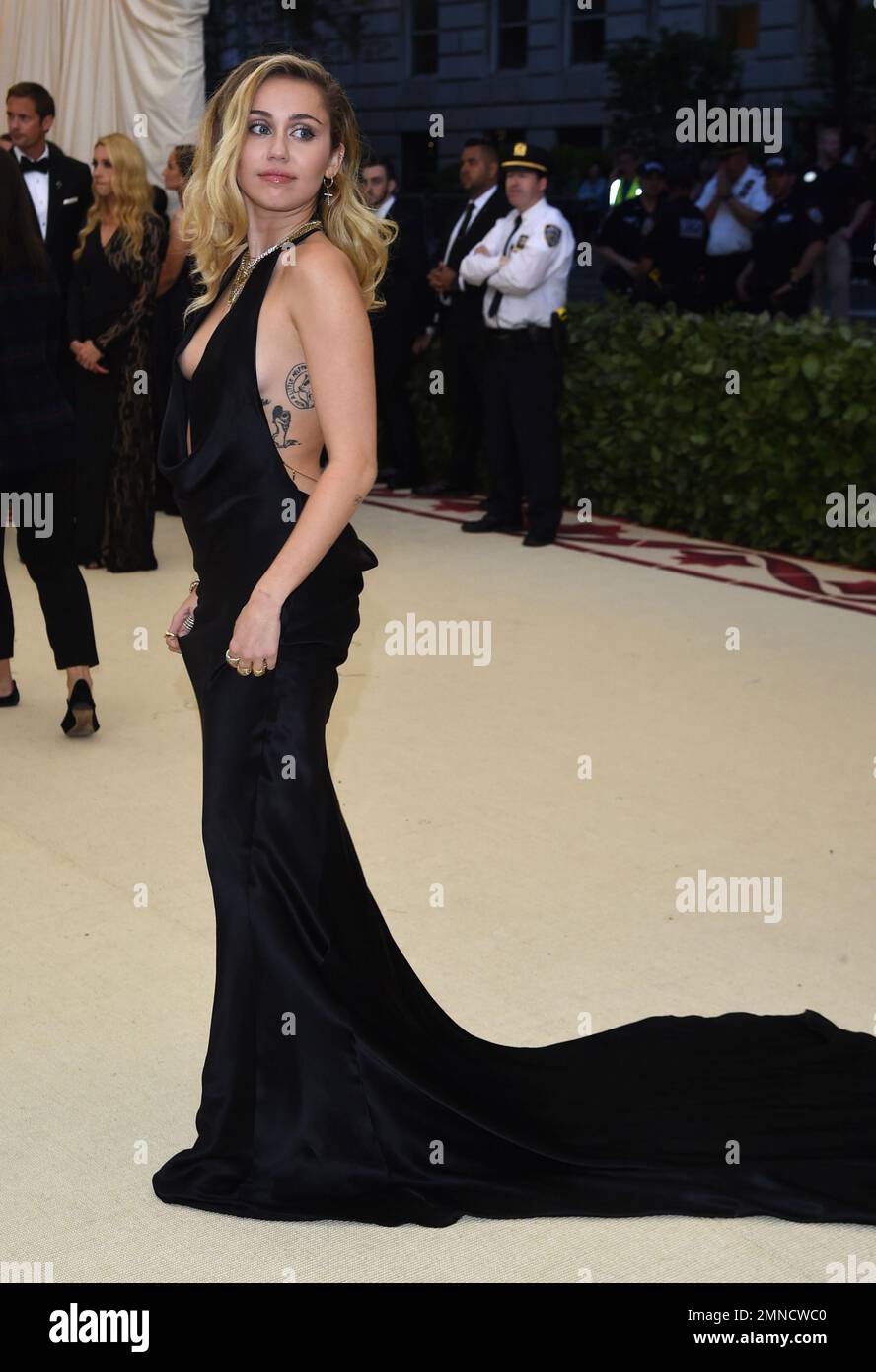 Miley Cyrus attends The Metropolitan Museum of Art's Costume Institute ...