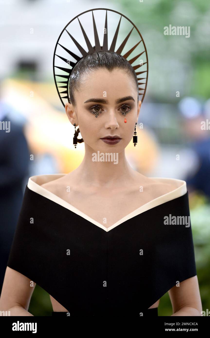 Lily Collins attends The Metropolitan Museum of Art's Costume Institute ...