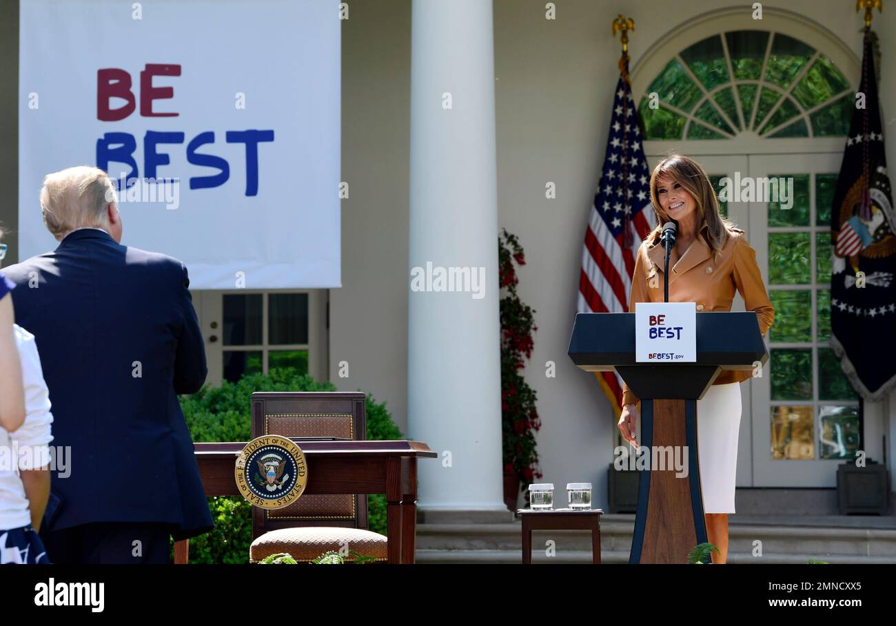 First lady Melania Trump looks at President Donald Trump as she arrives ...