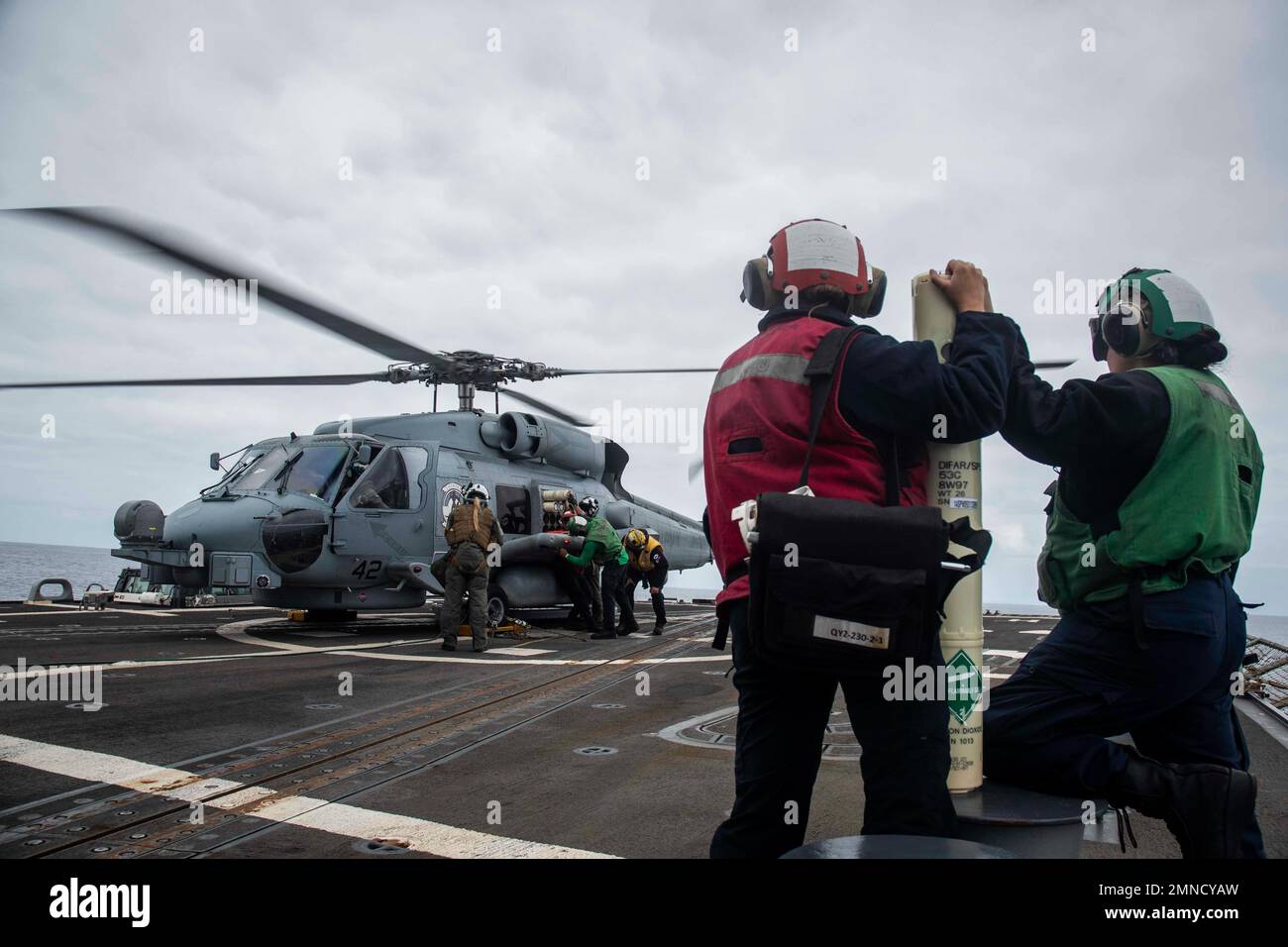 221001-N-XK462-1015 PACIFIC OCEAN (Oct. 1, 2022) U.S. Sailors load ...