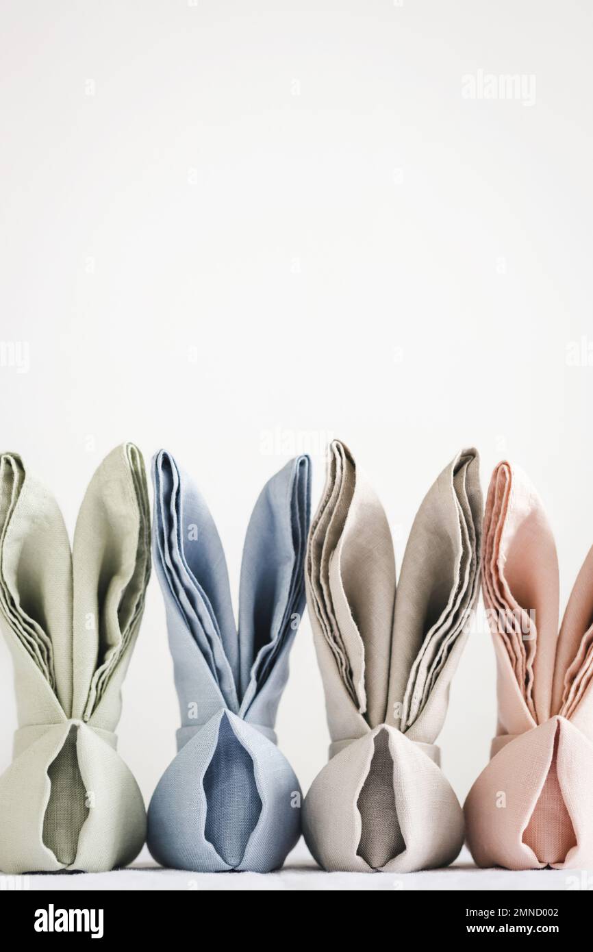 Easter bunny ear napkins on white backdrop with place for text Stock ...