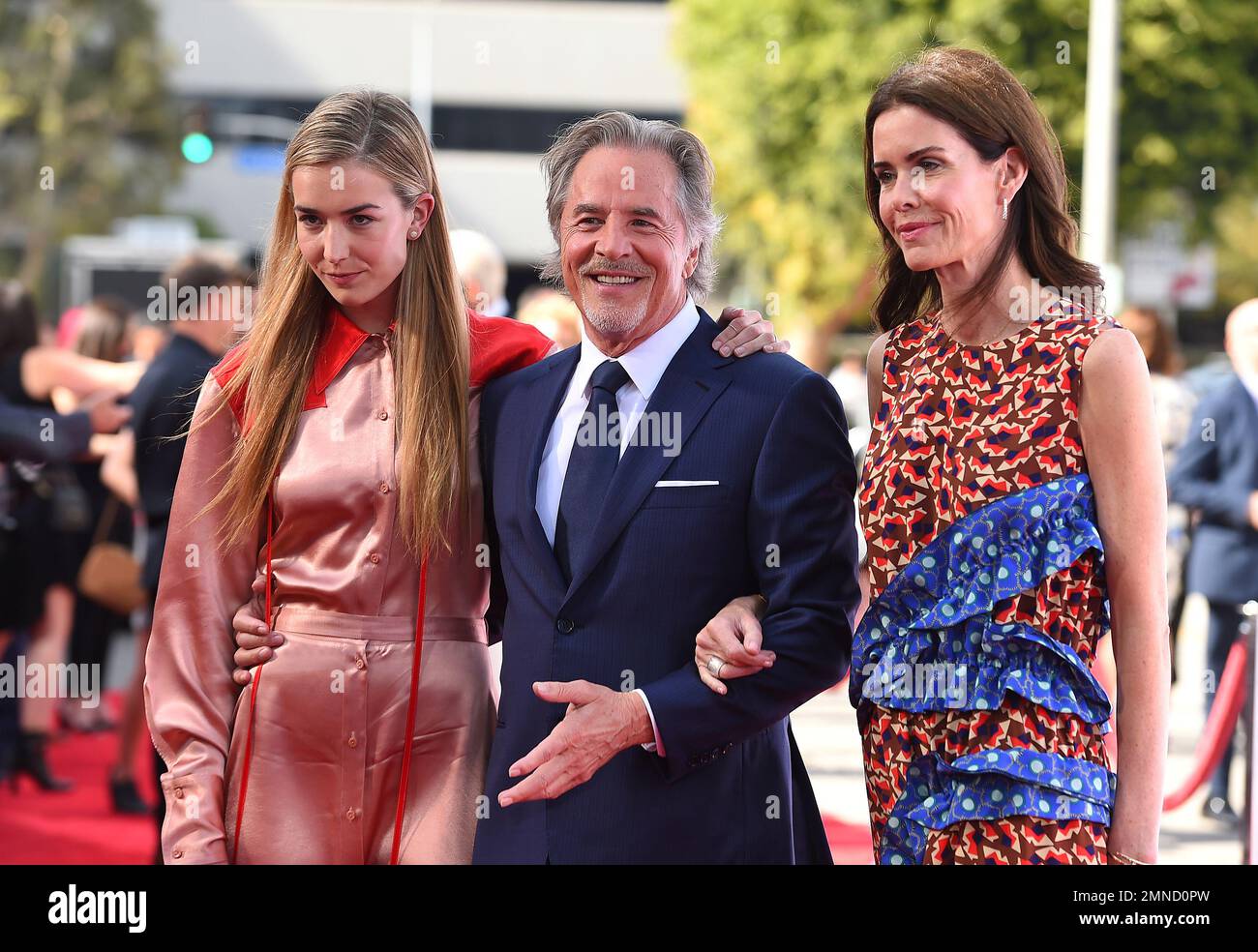 From left, Grace Johnson, cast member Don Johnson and Kelley Phleger ...