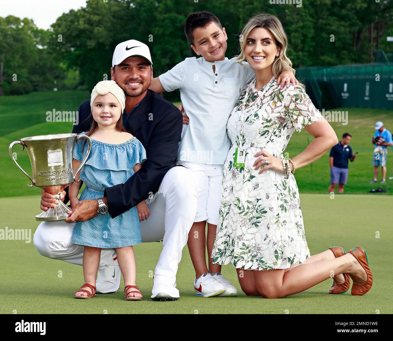 Jason Day, second from left, poses with, from left to right, his ...