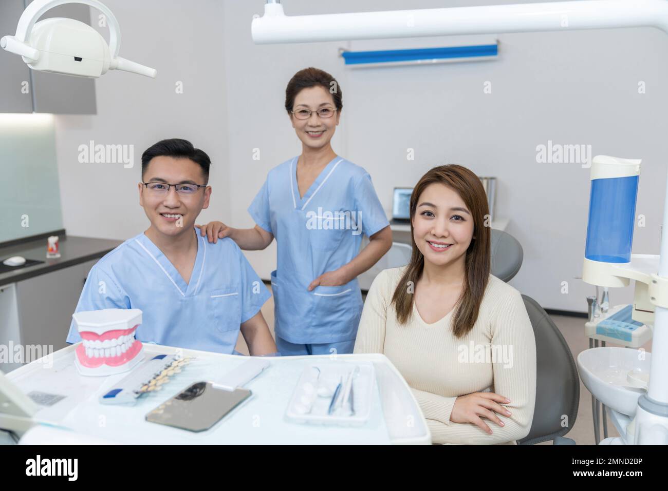 Doctors and patients in dental clinic Stock Photo - Alamy