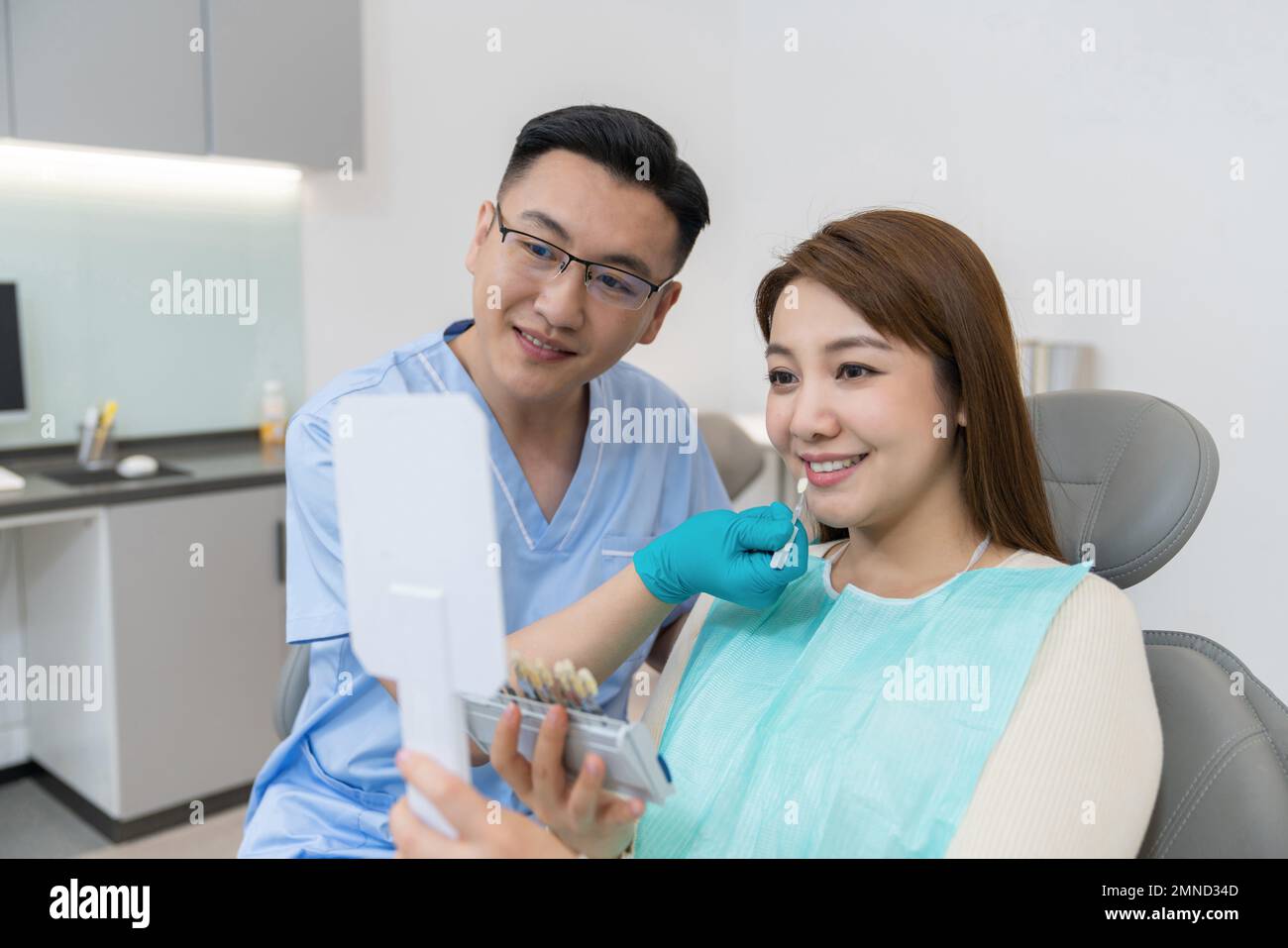 Doctors and patients in dental clinic Stock Photo - Alamy
