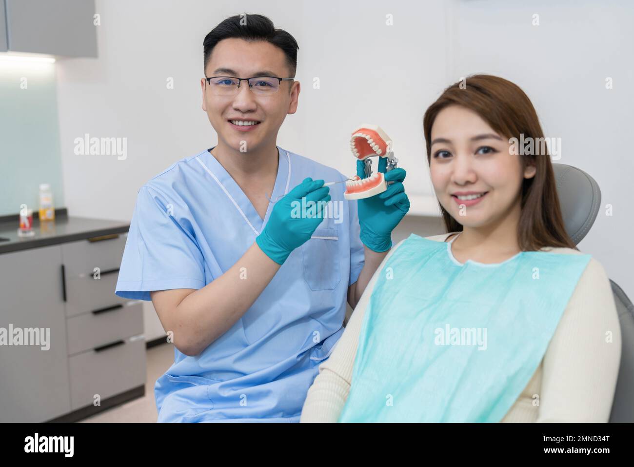 Doctors and patients in dental clinic Stock Photo - Alamy