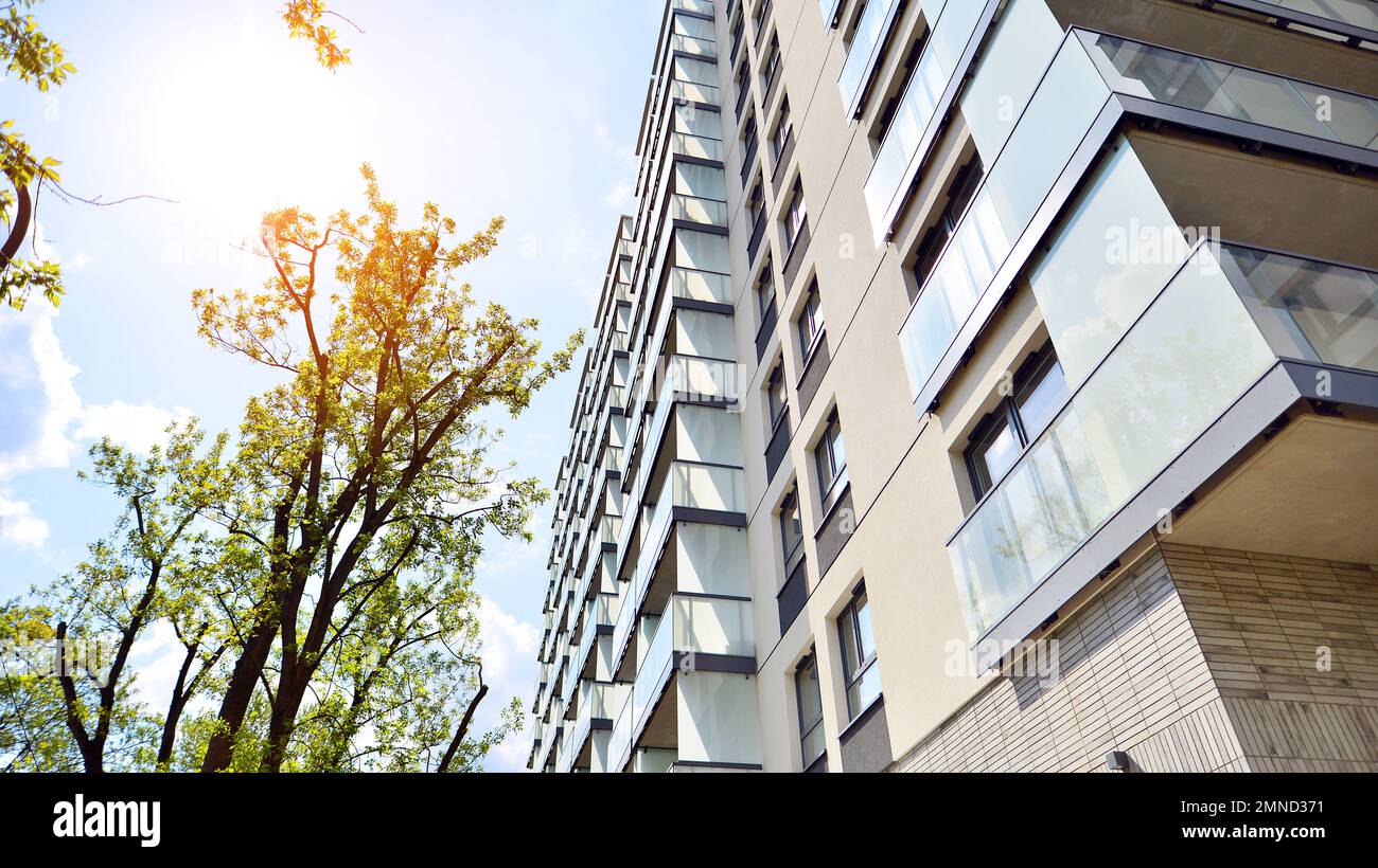 Futuristic square architecture of apartment building. Real estate with ...