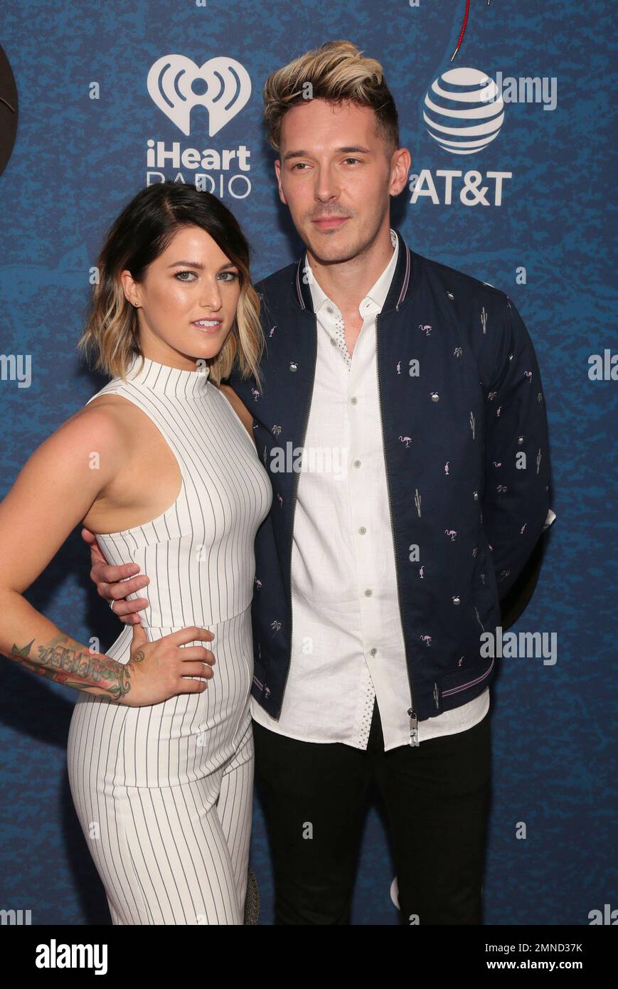 Cassadee Pope Left And Sam Palladio Arrive At The Iheartcountry Festival At The Frank Erwin