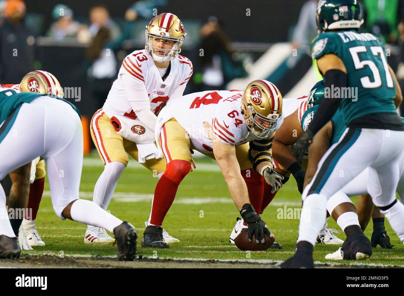 San Francisco 49ers quarterback Brock Purdy (13) looks on from behind ...