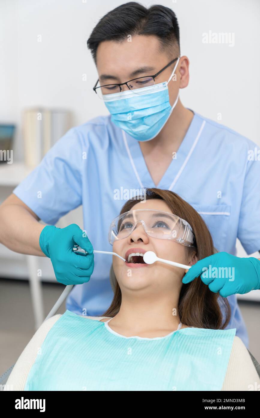 Doctors and patients in dental clinic Stock Photo - Alamy
