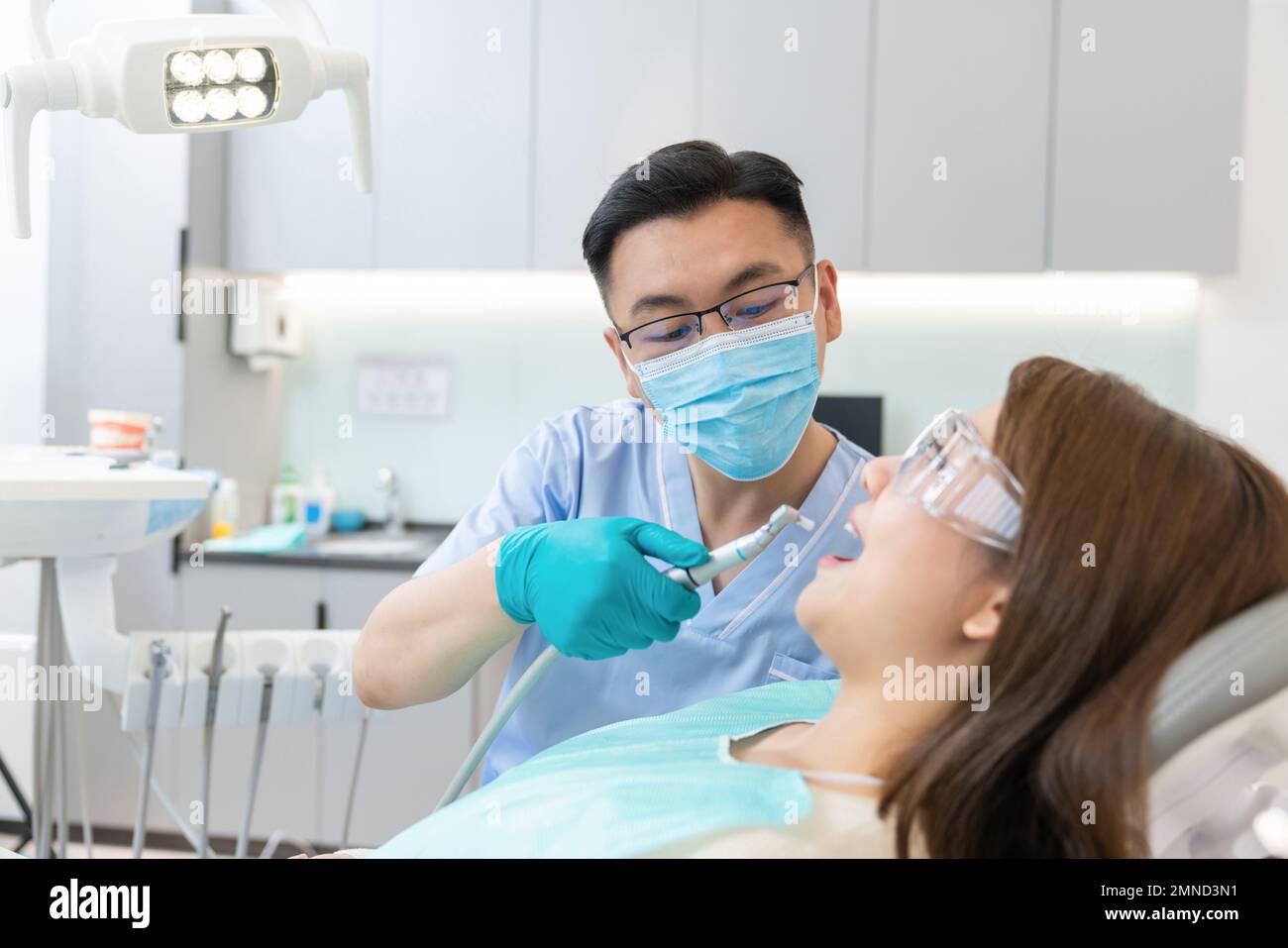 Doctors and patients in dental clinic Stock Photo - Alamy