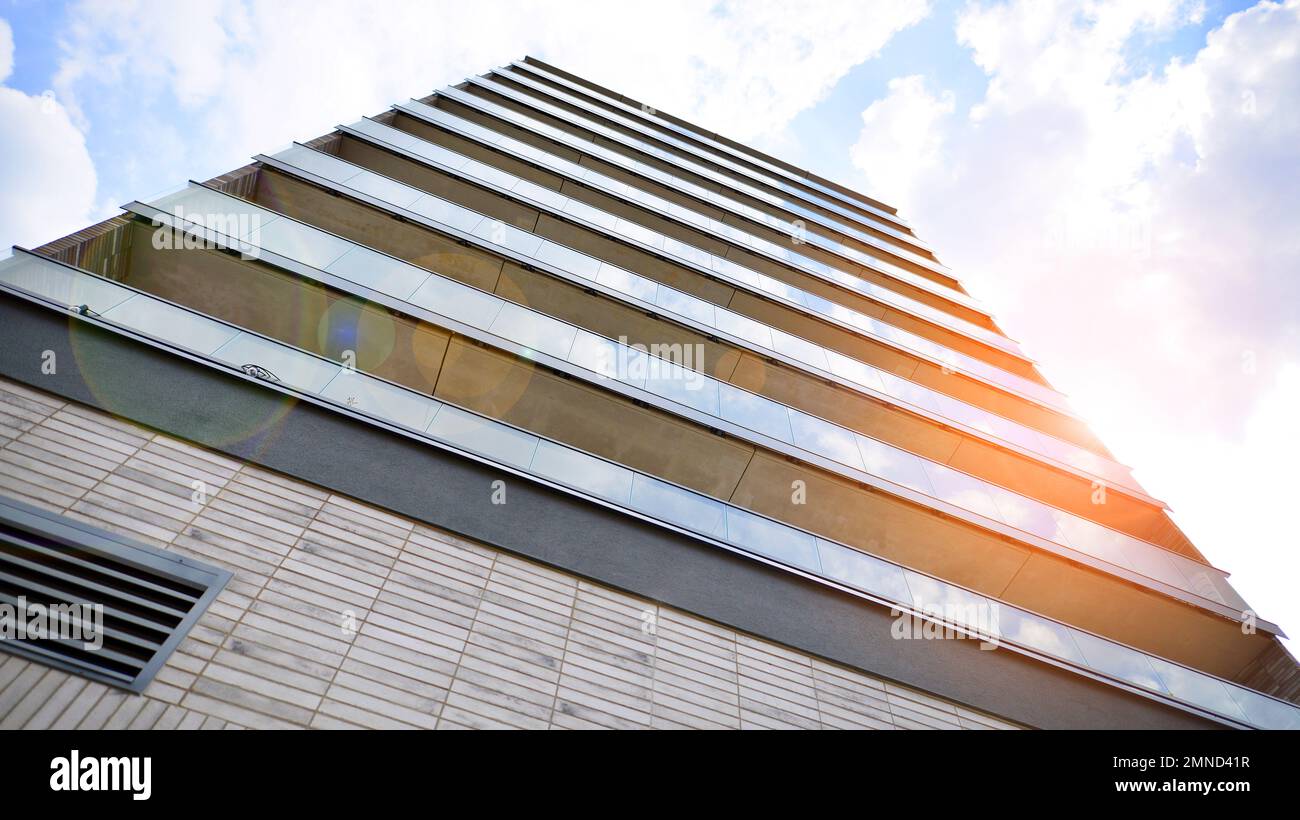 Futuristic square architecture of apartment building. Real estate with ...